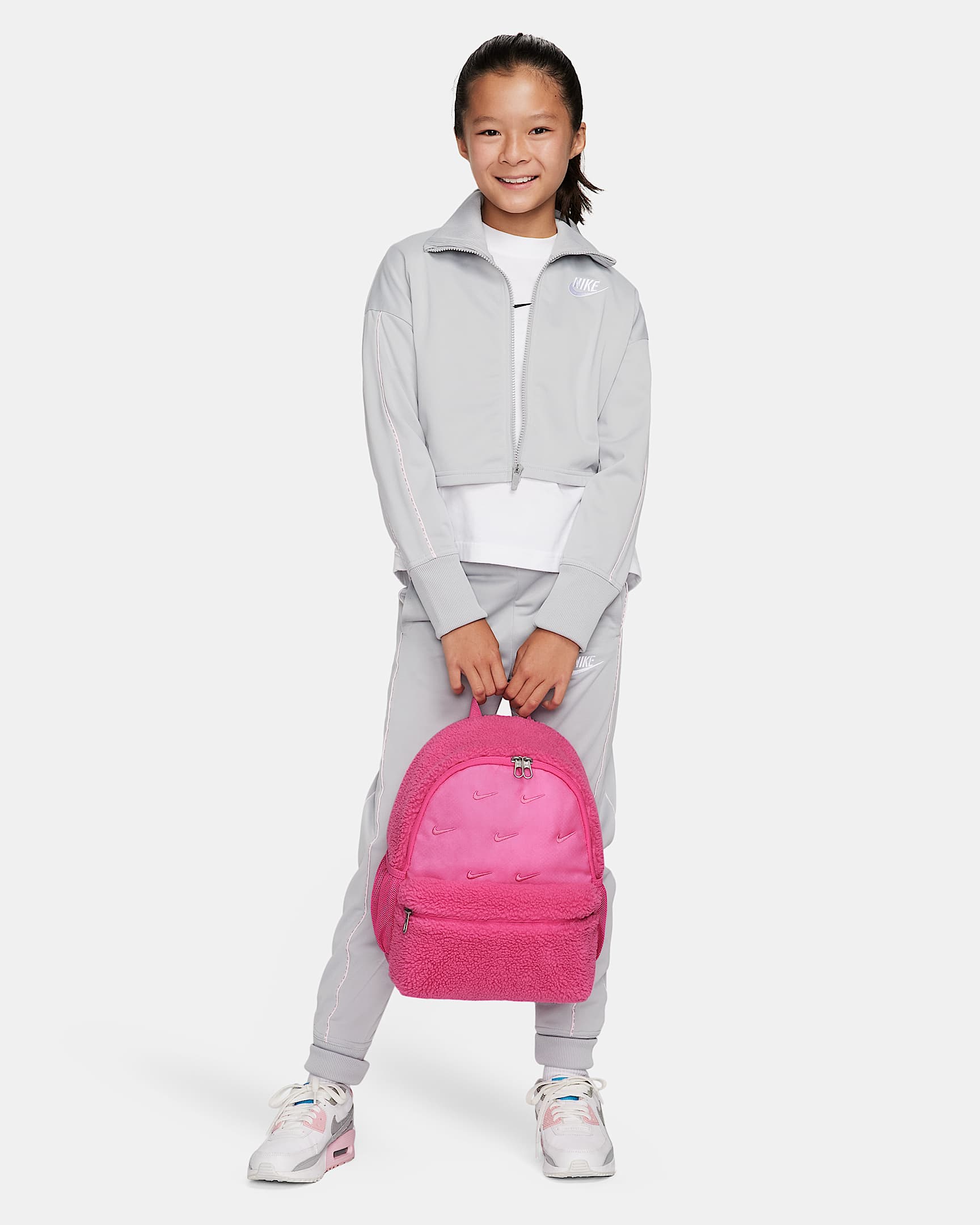 Nike Brasilia JDI Kids' Mini Backpack (11L). Nike NL