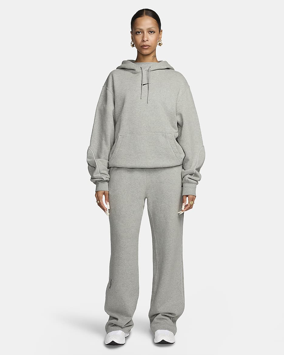 NOCTA NOCTA Fleece CS Trainingshose mit offenem Saum (Herren). Nike CH