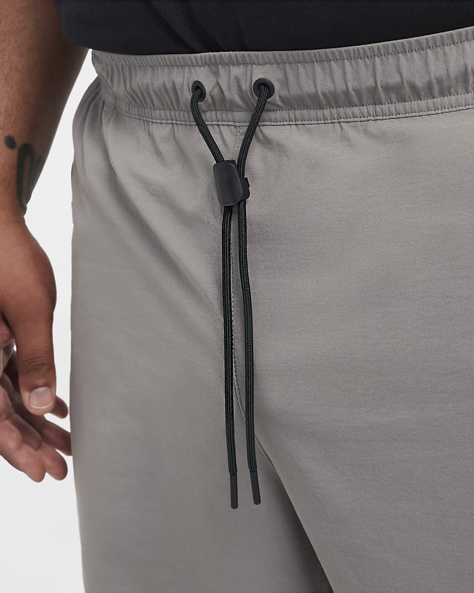 Nike Tech Men's Woven Trousers. Nike RO