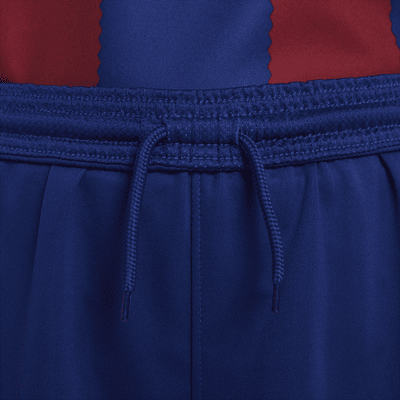 F.C. Barcelona 2023/24 Stadium Home Older Kids' Nike Dri-FIT Football Shorts. Nike DK