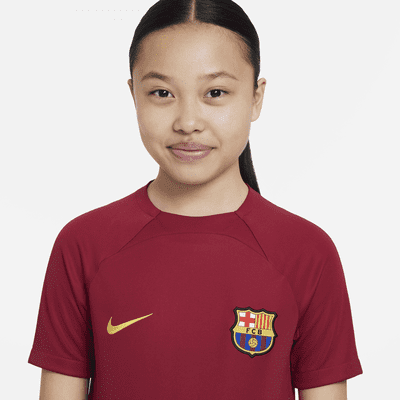 F.C. Barcelona Academy Pro Older Kids' Nike Dri-FIT Short-Sleeve Football Top. Nike CH
