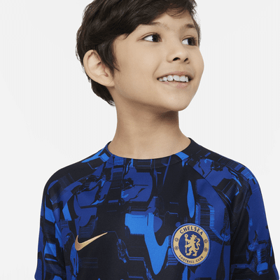Chelsea F.C. Academy Pro Older Kids' Nike Dri-FIT Pre-Match Football Top. Nike AT