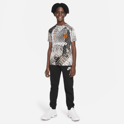Chelsea F.C. Older Kids' Nike Dri-FIT Pre-Match Football Top. Nike LU