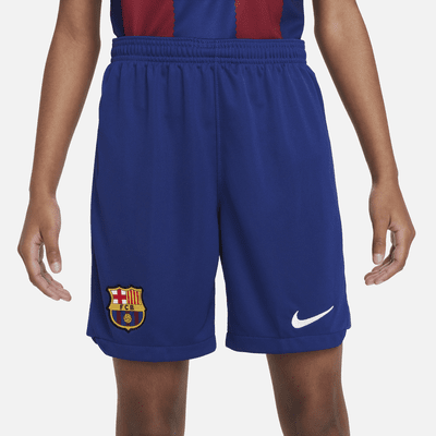 F.C. Barcelona 2023/24 Stadium Home Older Kids' Nike Dri-FIT Football Shorts. Nike DK