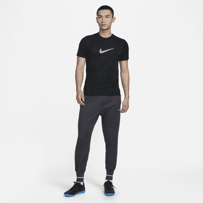 Nike Dri-FIT Academy Men's Short-Sleeve Graphic Football Top. Nike SG
