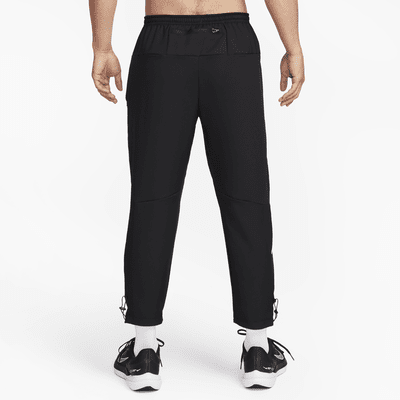 Nike Challenger Track Club Men's Dri-FIT Running Trousers. Nike PH