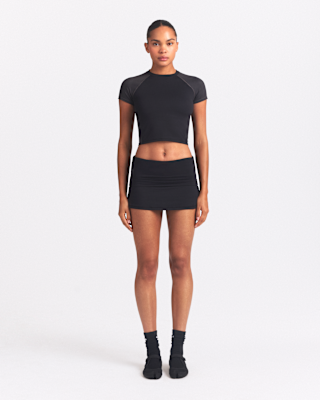 Saia-calção com cintura dobrável NikeSKIMS Airy para mulher. Nike PT