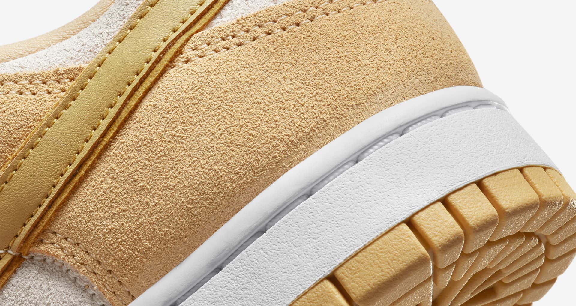 Women's Dunk Low 'Gold Suede' (DV7411-200). Nike SNKRS LU