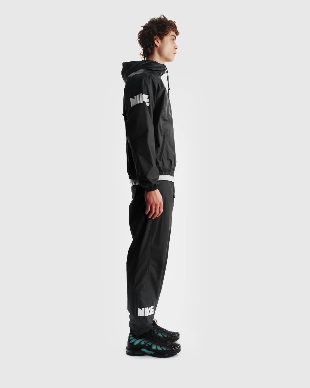 Pantalon tissé à motif Nike Windrunner pour homme. Nike CH